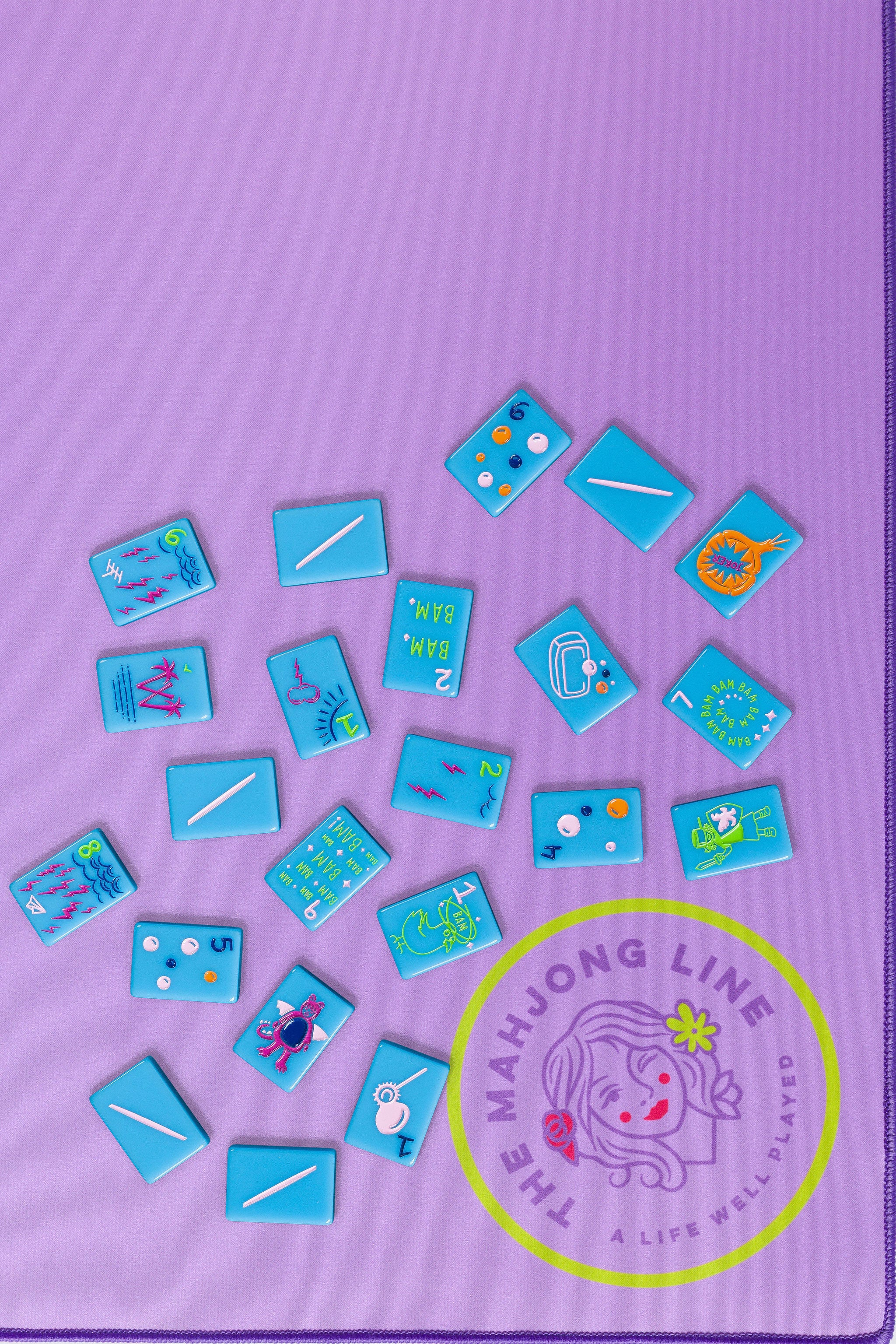 Lilac game mat paired with mahjong tiles– The Mahjong Line