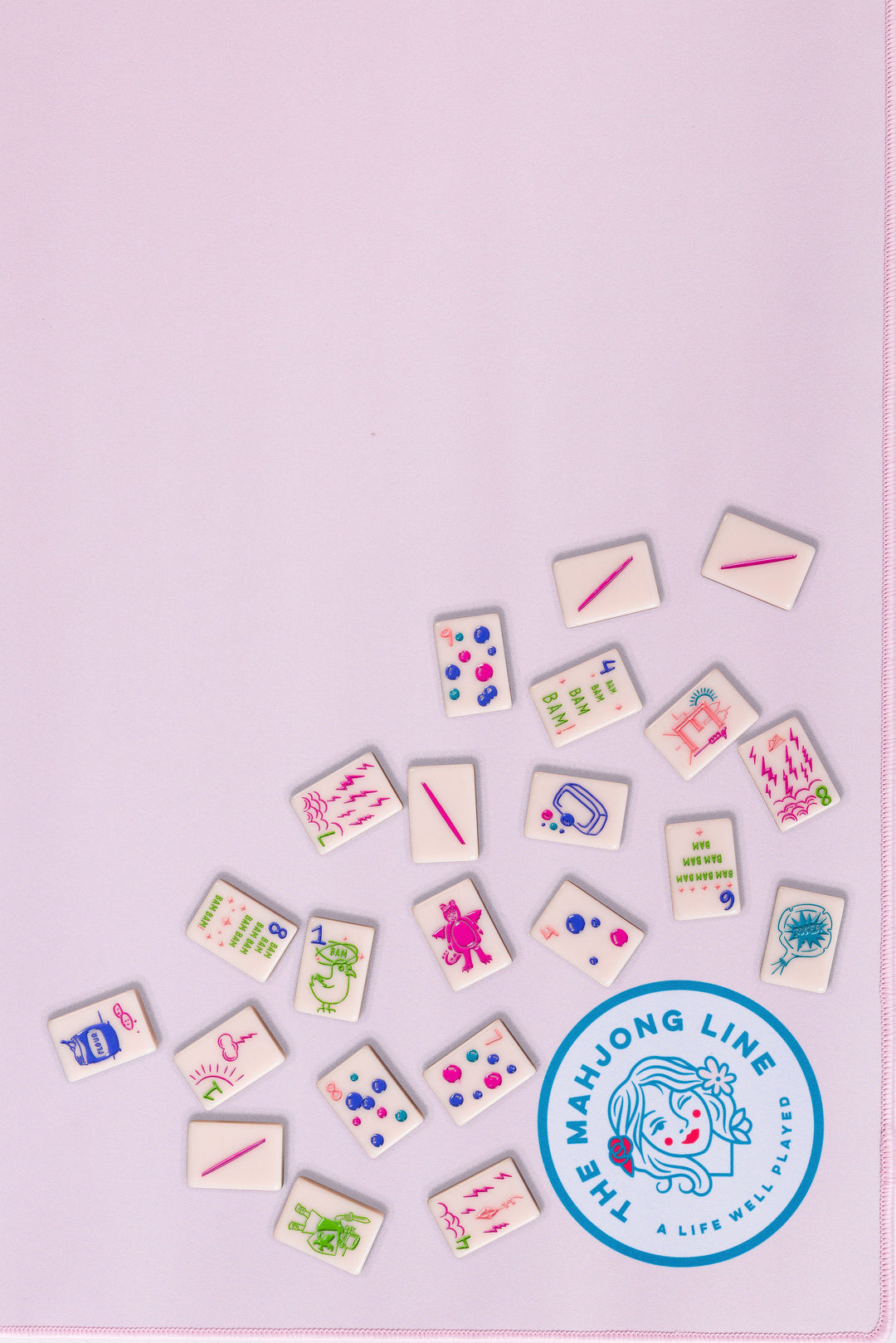 Pink game mat paired with mahjong tiles– The Mahjong Line
