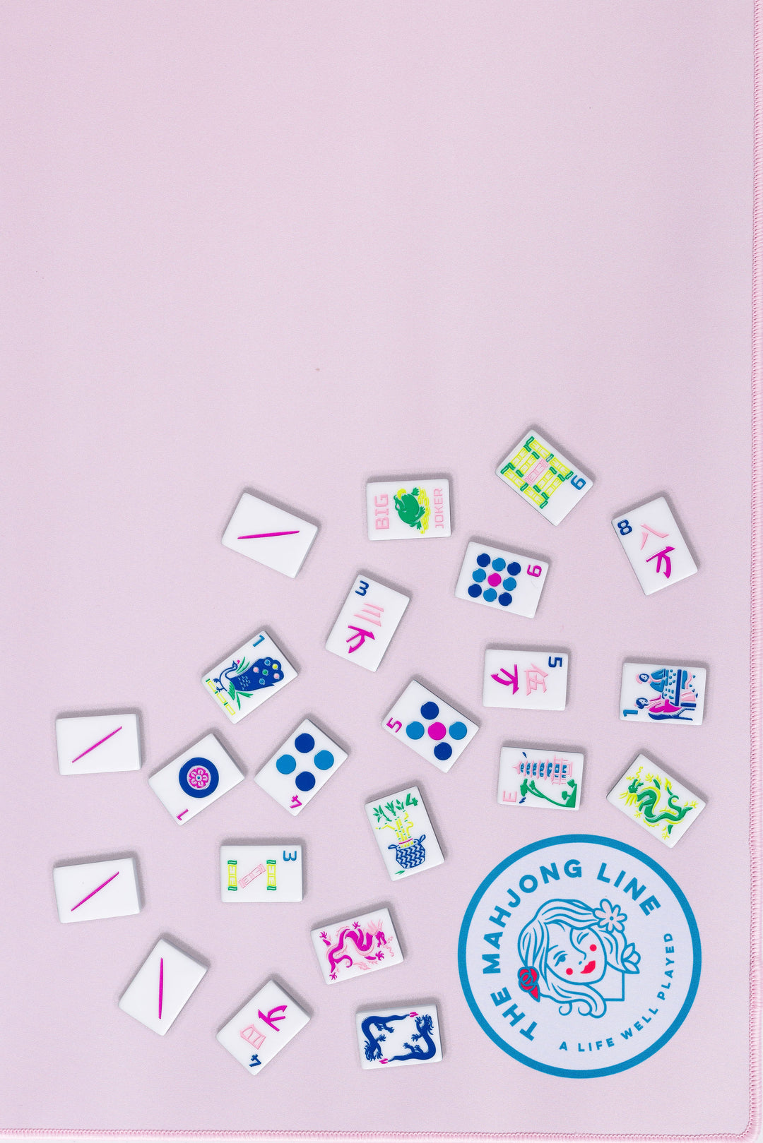 Pink game mat paired with mahjong tiles– The Mahjong Line