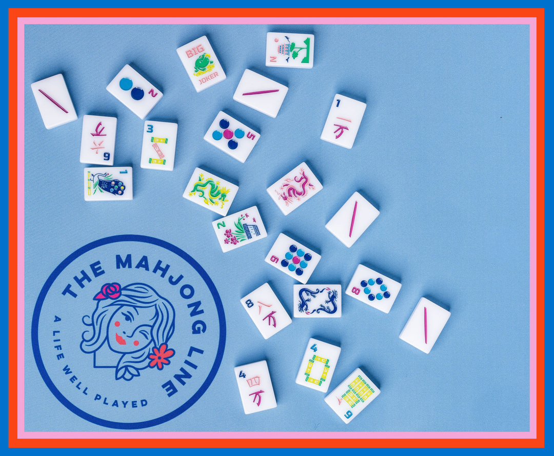 Light blue game mat paired with mahjong tiles– The Mahjong Line