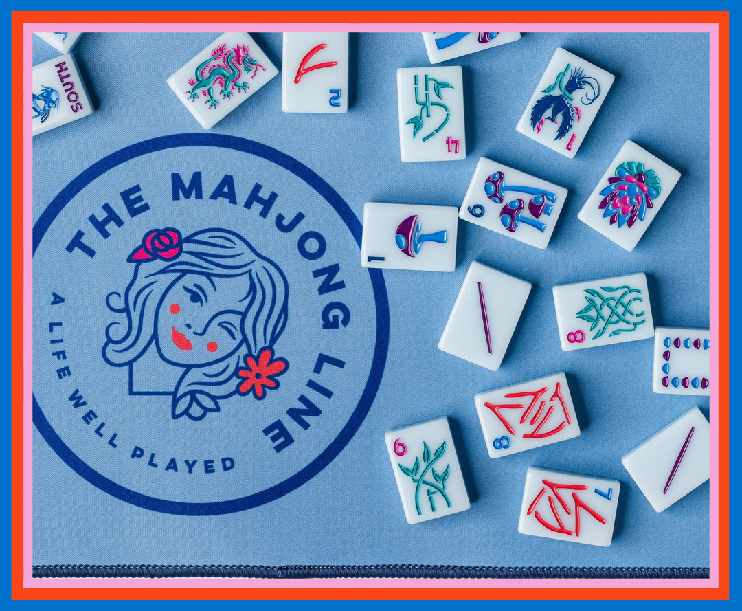 Light blue game mat paired with mahjong tiles– The Mahjong Line